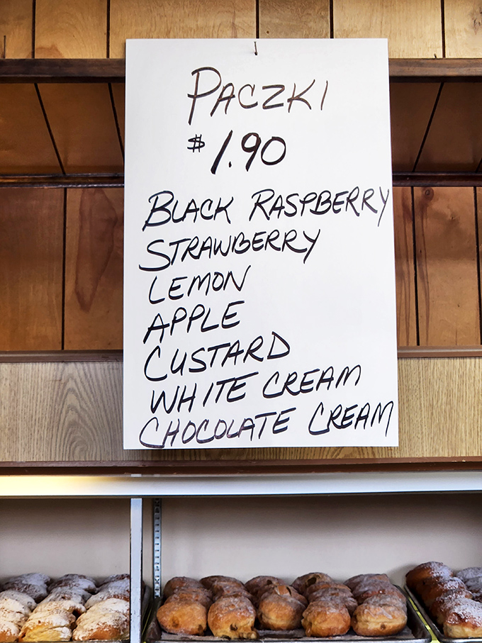 The paczki flavor board reads like poetry for your taste buds, each option more tempting than the last.