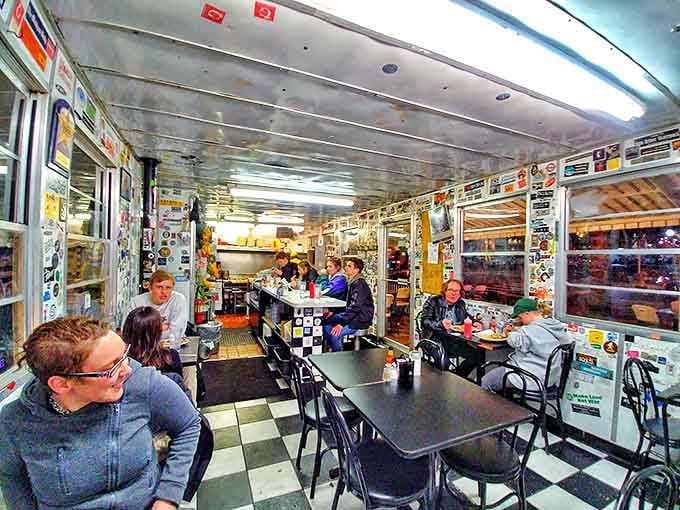 The tiny dining room buzzes with conversation at all hours, a cross-section of humanity united by good food and unpretentious surroundings.