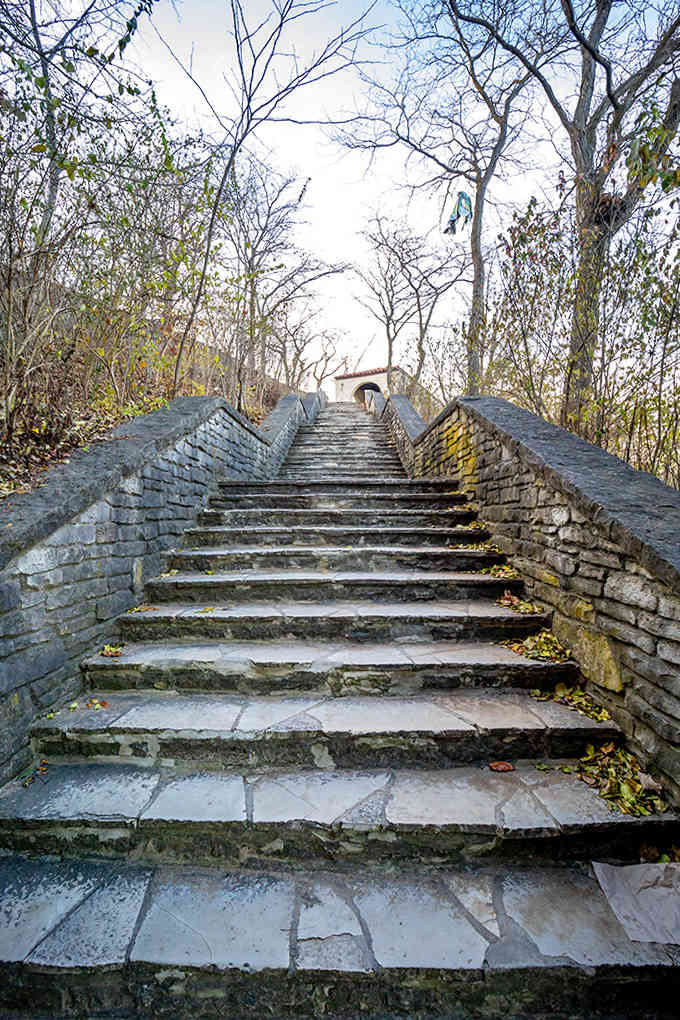 Each stone step leads visitors closer to beach bliss, a ceremonial descent that countless feet have traveled in pursuit of summer memories.