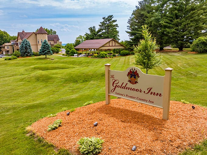 The Goldmoor Inn sign stands proudly amid manicured grounds, announcing "Wisconsin's Premier Country Inn" with understated elegance.