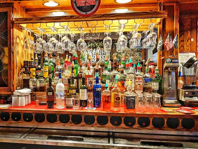 The bar area where wine glasses hang like crystal chandeliers and good times flow freely.