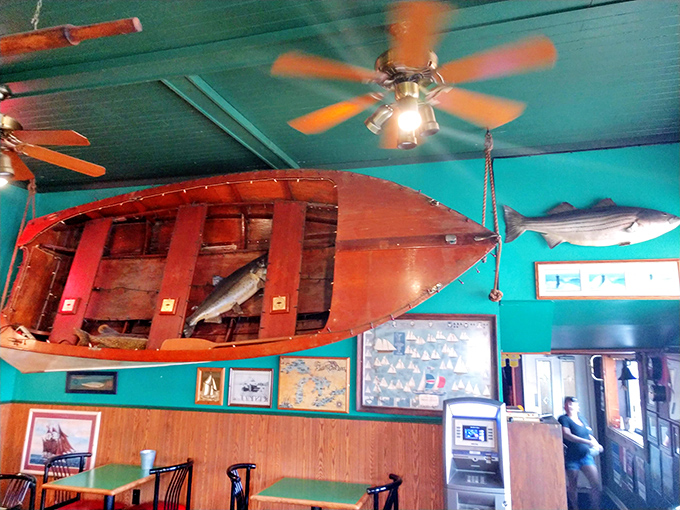 That stunning turquoise ceiling with the boat suspended above &ndash; nautical charm that transports you while you dine.