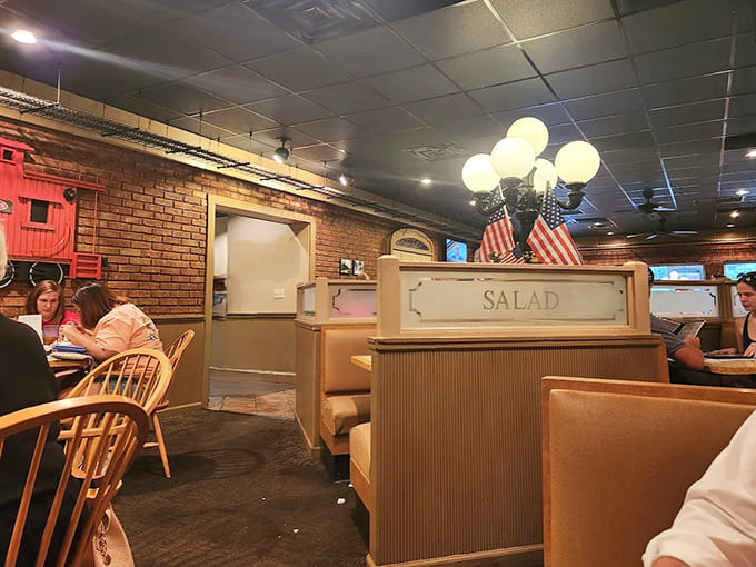 More exposed brick and cozy seating create multiple spaces where every table feels like the best seat available.