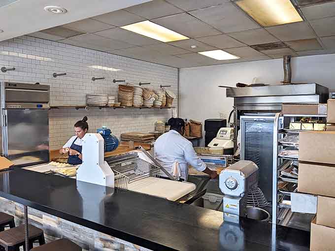 Clean workspace, fresh ingredients, skilled hands, this is where the magic happens before it lands on your plate looking absolutely perfect.