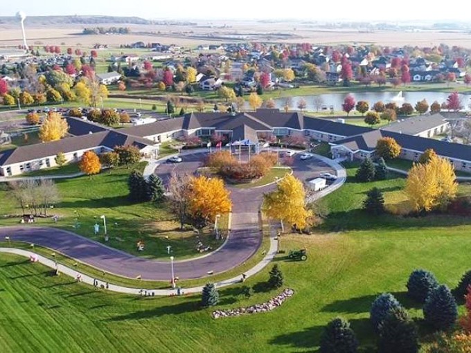 Aerial view reveals Luverne's perfect balance &ndash; a community nestled between cultivated fields and natural prairie beauty.
