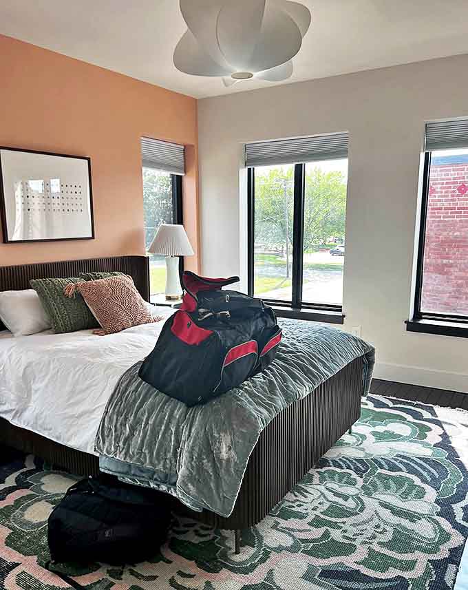 Contemporary design with pops of coral and modern fixtures shows how thoughtfully each guest room has been updated for today's travelers.