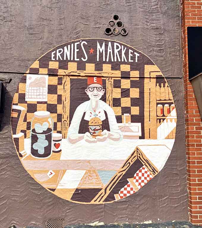 This vibrant mural has become a neighborhood landmark, perfectly capturing the joy and craftsmanship that goes into every sandwich created inside these walls.