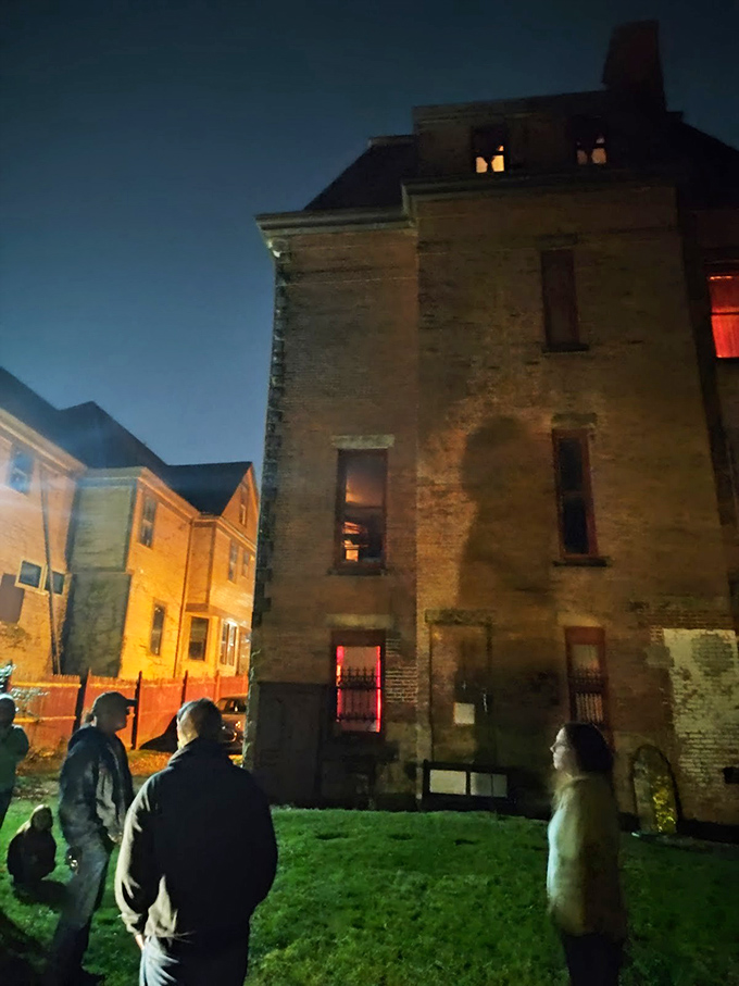 Even at night, curiosity seekers gather to glimpse Cleveland's most famous residence, hoping the castle will reveal its secrets.