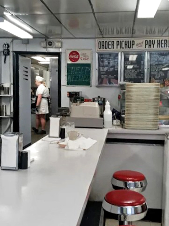 Pick up Area: Where the magic happens &ndash; orders called in diner shorthand, plates appearing with practiced precision, and coffee cups that never seem to empty.