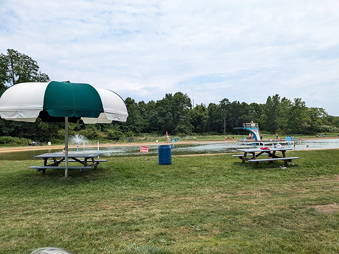 Picnic perfection under striped umbrellas, where the hardest decision you'll make all day is whether to nap before or after your second sandwich.