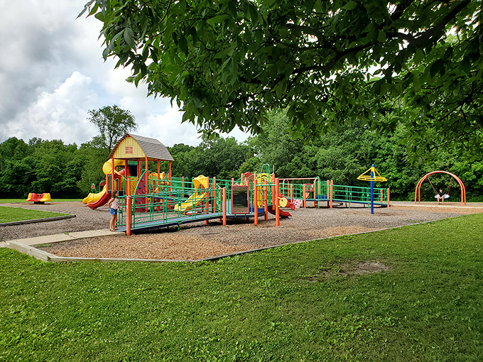 The playground balances modern safety with old-fashioned fun, proving kids don't need flashing lights to have a blast.