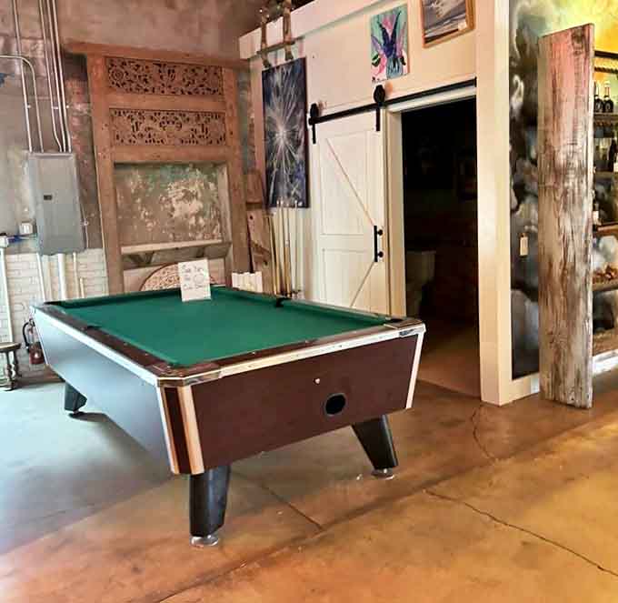 Because nothing says "stay awhile" like challenging your friend to a game after finishing your latte in this rustic-chic corner.