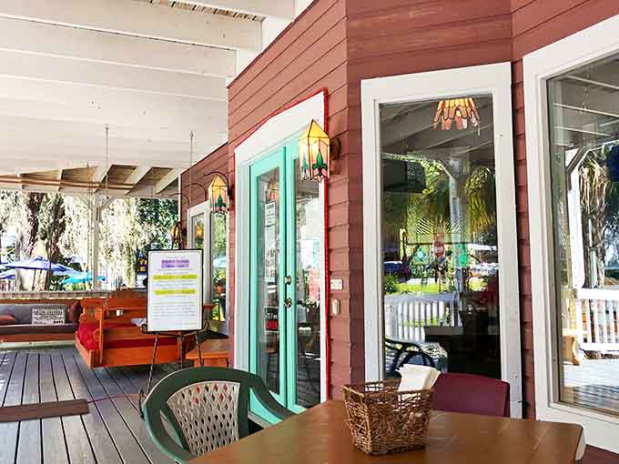 The covered porch offers the perfect spot to enjoy Florida weather while protecting you from too much sunshine.