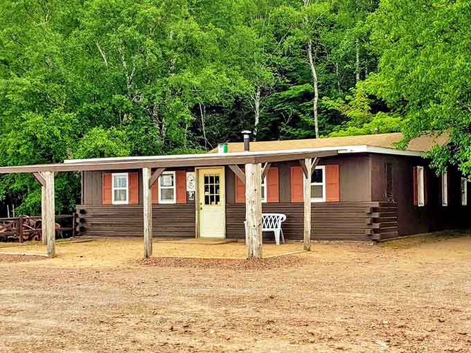 This unassuming cabin serves as visitor headquarters, its rustic charm perfectly matching the authentic mining experience beyond.