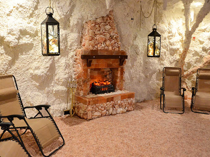 Ancient meets modern as flickering flames dance against salt-crystal walls. This isn't just a fireplace&mdash;it's a portal to peak relaxation.