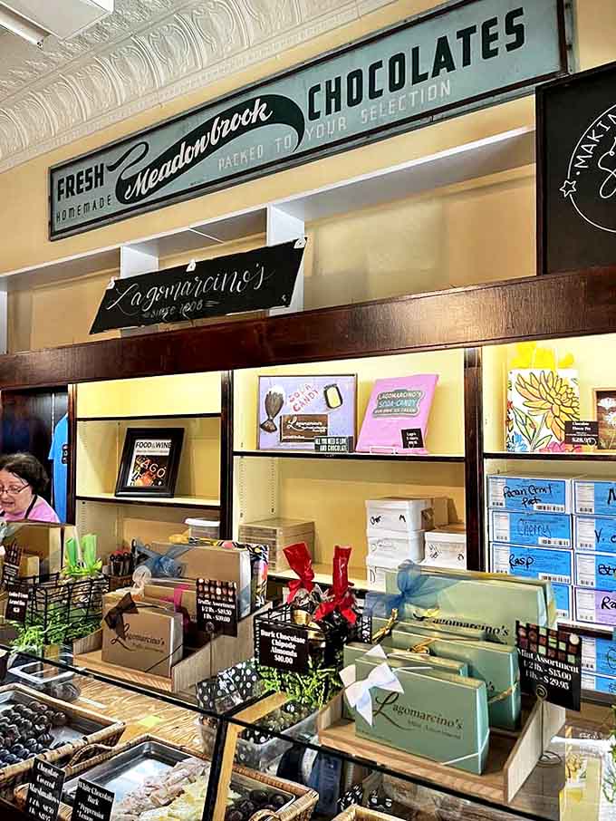 Stained glass accents and vintage shelving create the perfect backdrop for confections that deserve their own museum exhibit.