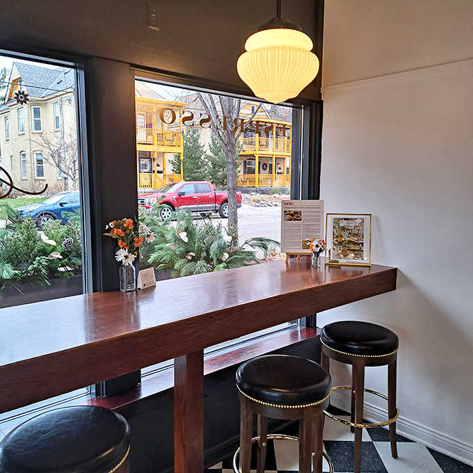 Window seating offers the perfect perch for people-watching while contemplating whether to order a second pastry. Spoiler alert: you will.