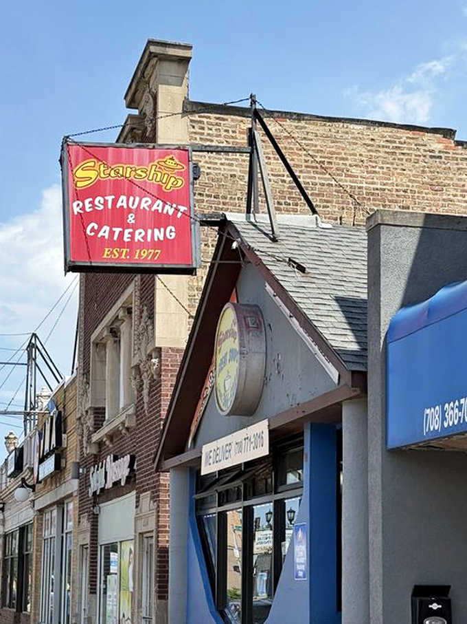 That vintage neon sign beckons hungry travelers like a beacon in space, promising sustenance and maybe some tribbles.