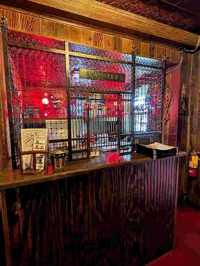 Like something from an old Western film, the cashier's station combines functionality with a hefty dose of historical character.