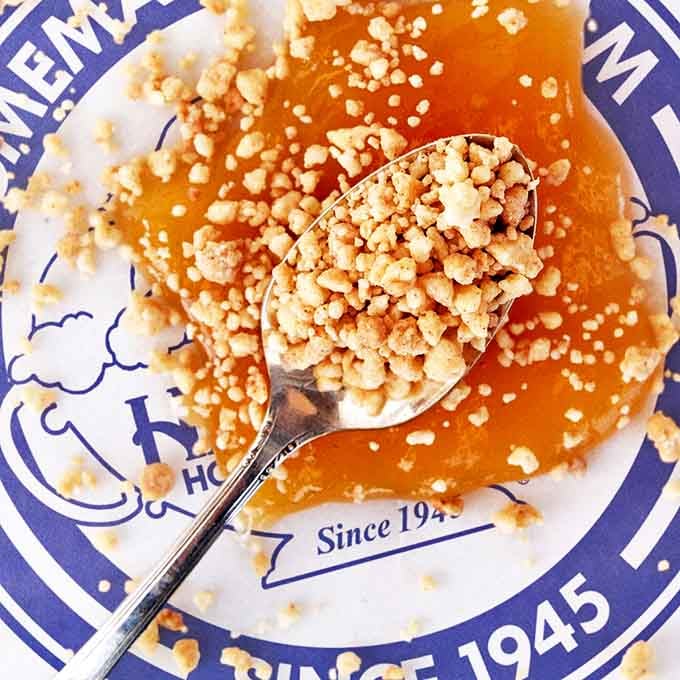 Golden crumbles waiting to enhance already-perfect caramel &ndash; because sometimes good things deserve to be made even better.