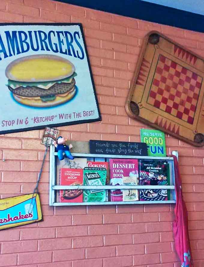 A time capsule of Americana - vintage signs, cookbooks, and playful touches that create the diner's distinctive personality.