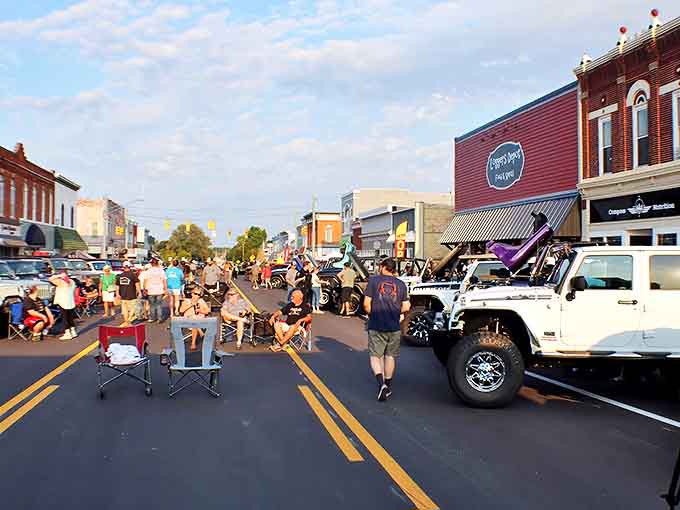 Community events spill into streets as residents claim prime viewing spots, the line between audience and participants blurring in true small-town fashion.