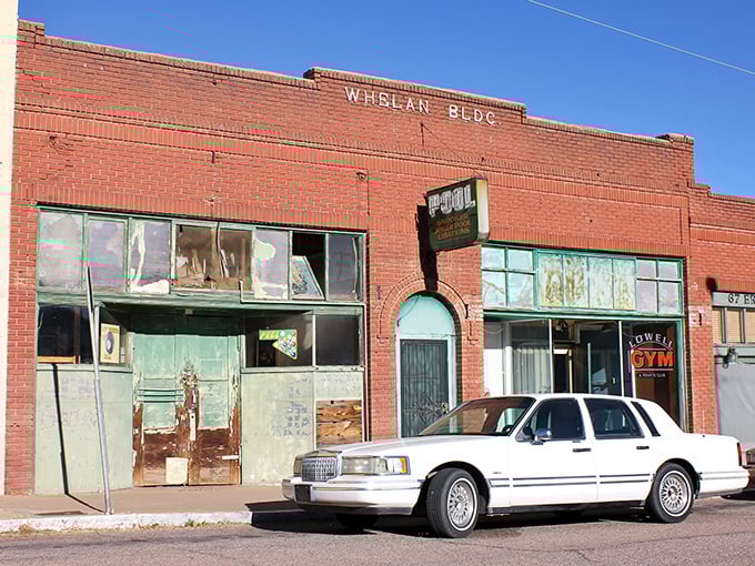 The Whelan Building's faded glory and pool hall sign hint at social life in this once-bustling mining community.