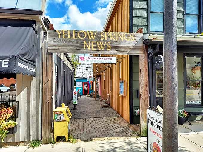 This wooden archway leads to a hidden alley of delights, proving the best discoveries often happen when you venture off the main path.