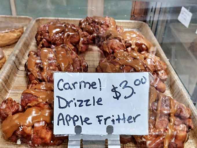 Apple fritters that could double as hand weights &ndash; if you weren't too busy devouring their caramel-drizzled, apple-studded magnificence.