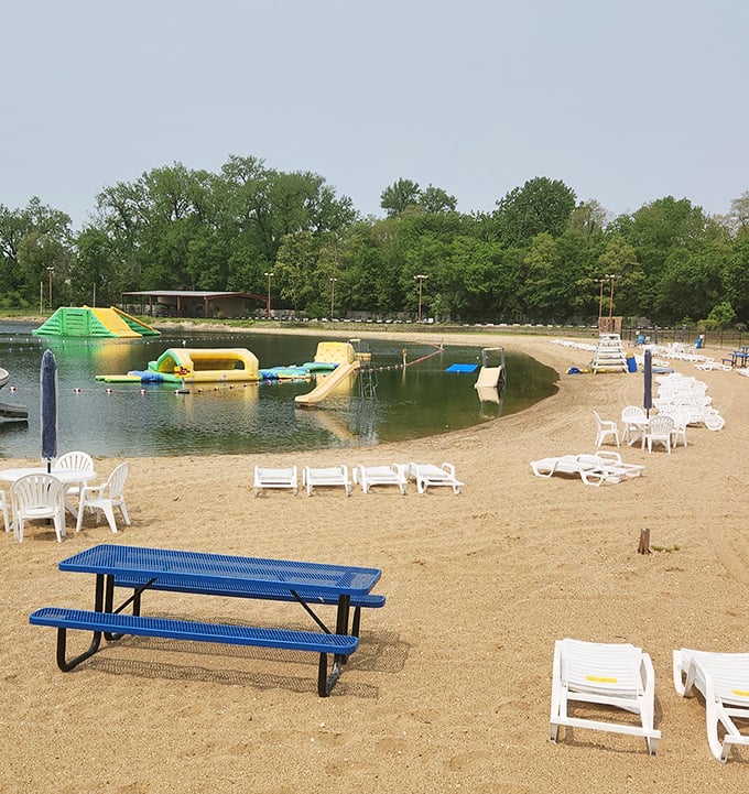 Beach chairs await as colorful inflatables dot the water &ndash; summer's perfect equation of relaxation plus adventure.