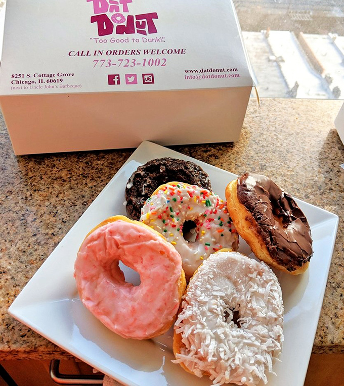 A rainbow of donut possibilities, from classic glazed to colorful frosted varieties—each one hand-crafted to perfection.
