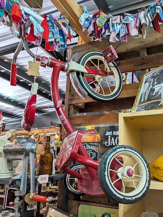 That red tricycle hanging from the ceiling isn't just decoration&mdash;it's childhood nostalgia suspended in time, waiting to trigger happy memories.