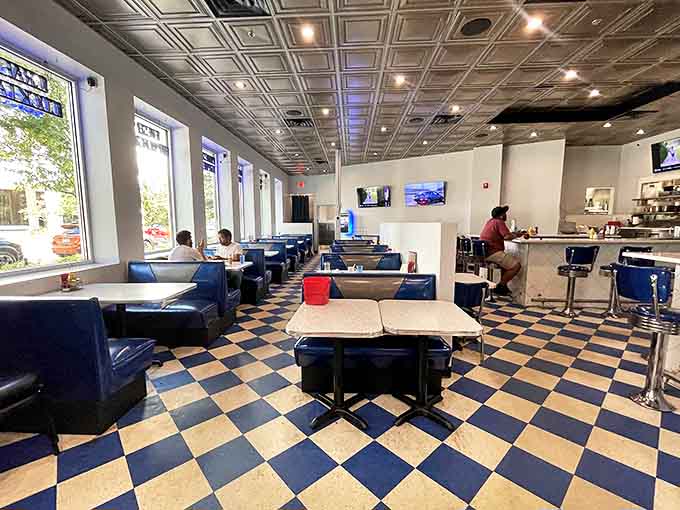 Blue vinyl booths invite you to sink in and stay awhile &ndash; somehow managing to be both vintage and surprisingly comfortable.