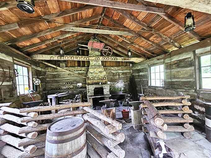 Inside a pioneer cabin workshop, rustic tools and a central fireplace reveal how settlers crafted necessity into art long before power tools existed.