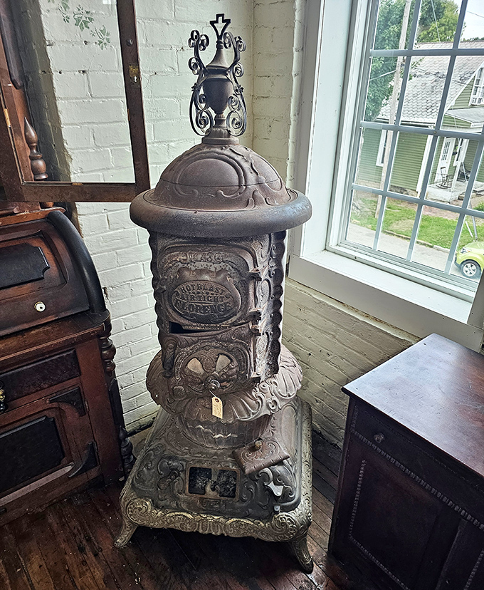 The "Florence" parlor stove once warmed a family's entire home, its cast iron elegance putting modern heaters to shame.