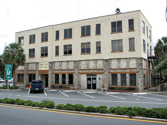 Dade City's stone-faced City Hall stands as solid as the community it serves, with a no-nonsense approach to civic architecture.