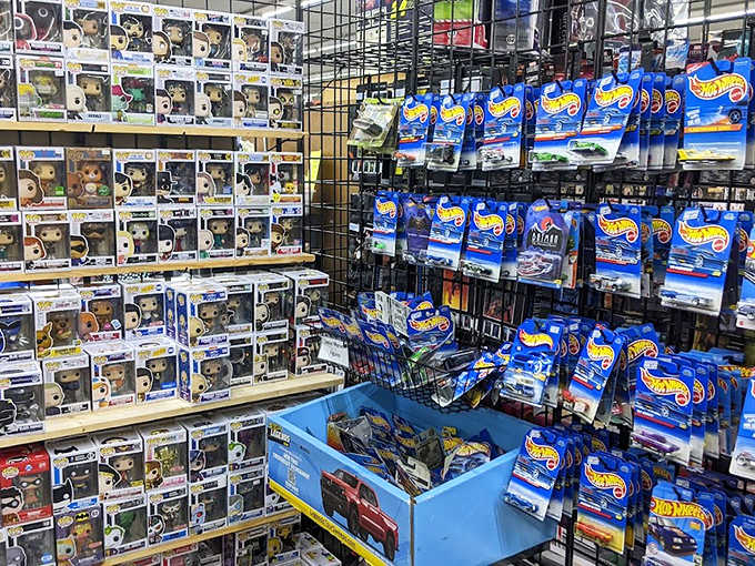 Collectible toys and merchandise create a wall of pop culture glory, where franchises from Star Wars to superheroes offer fans their next prized possession.