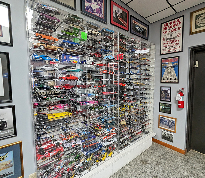 This wall of miniature racing history contains more horsepower per square foot than most actual garages&mdash;just at 1/24th the size.