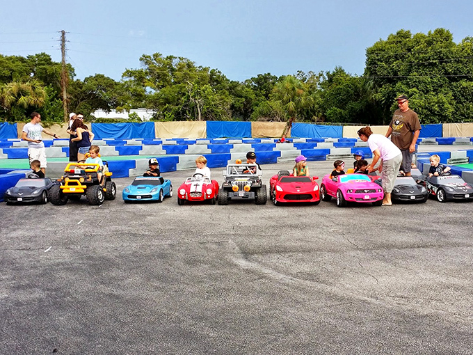 The kids' racing program features a rainbow of miniature vehicles, creating future motorsport enthusiasts one lap at a time.