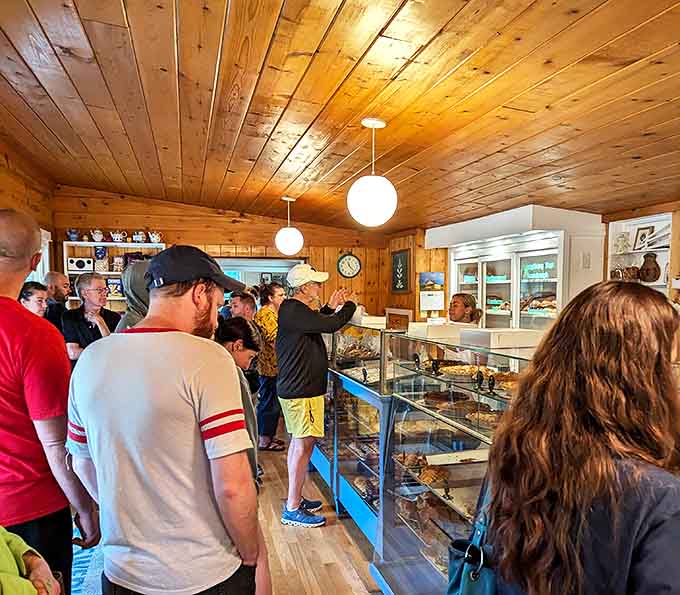 The weekend rush brings a cross-section of pastry enthusiasts – from cycling groups to families, all united in pursuit of cardamom-scented bliss.