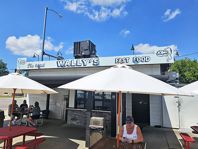 The spacious outdoor seating area welcomes families, friends, and solo diners alike to enjoy their meals al fresco.