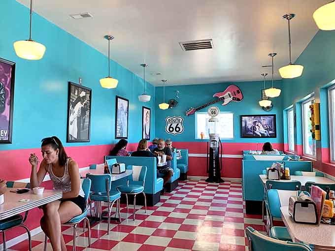 The diner fills with a diverse crowd united by the universal language of good food and the magnetic pull of authentic American nostalgia.