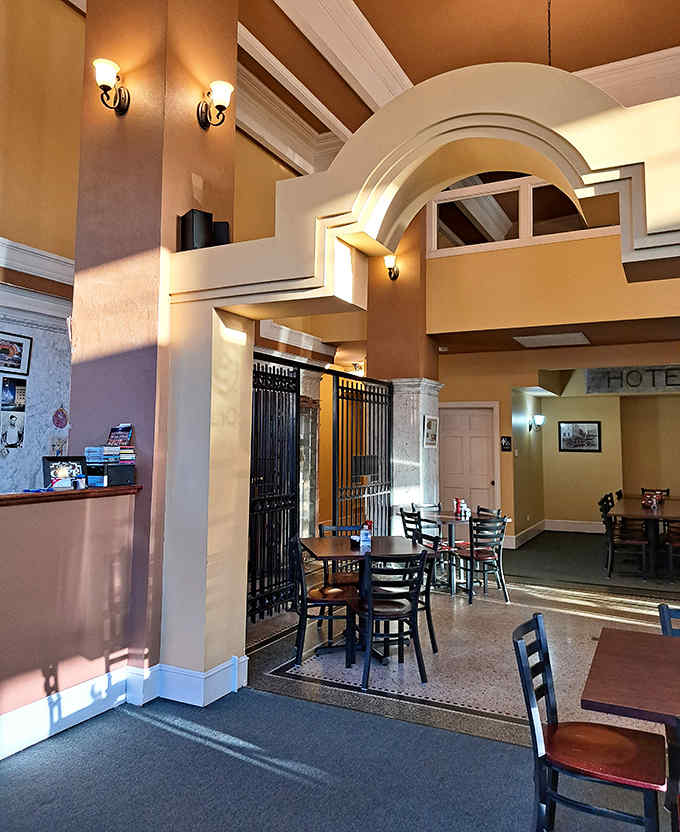 Warm lighting, historic details, and comfortable seating create an atmosphere that's both impressive and cozy &ndash; banking on ambiance!