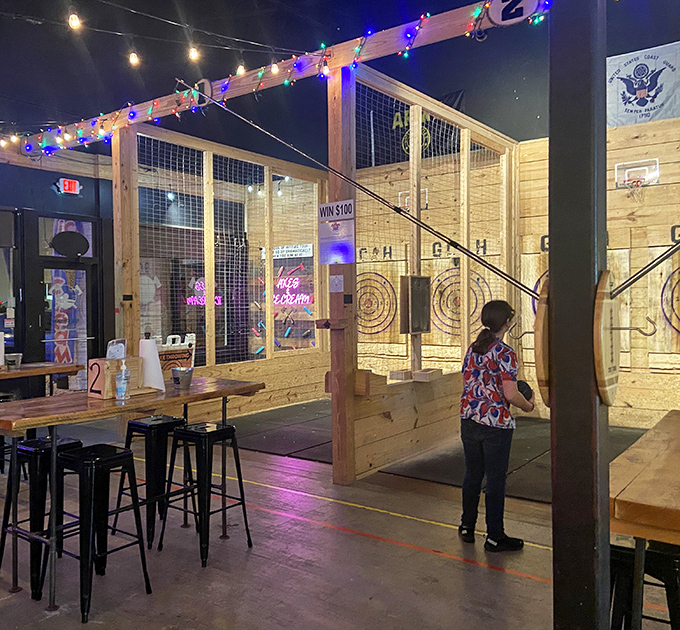 Axe throwing meets mini-golf! This multi-entertainment zone offers something for everyone, from target practice to table games.
