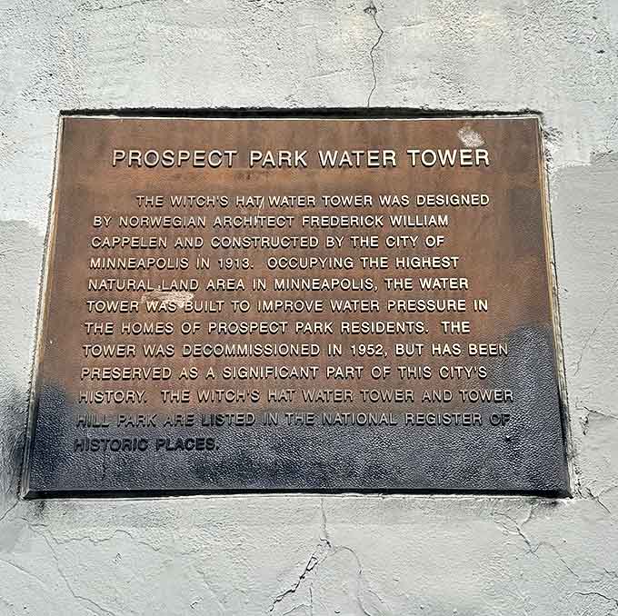 History etched in bronze &ndash; this plaque tells the tower's story, from practical water storage to beloved Minneapolis icon.
