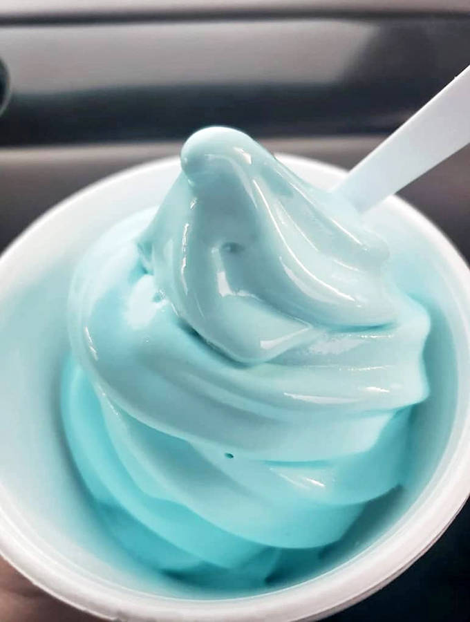 Blue raspberry soft serve that looks like it came straight from a childhood dream &ndash; the kind of treat that makes adults smile like kids again.
