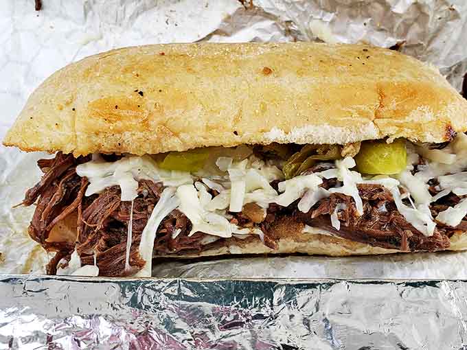 The Italian beef sandwich is piled high with seasoned meat, ready to make your taste buds sing patriotic songs.