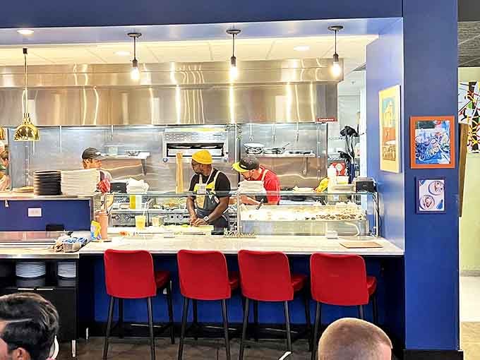 The open kitchen concept turns dinner into dinner theater, with chefs as the starring cast in this delicious production.