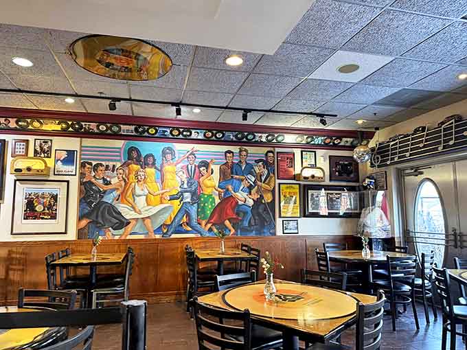 That mural celebrates the joy of music and dancing, reminding us that life's too short for boring walls or bland food.