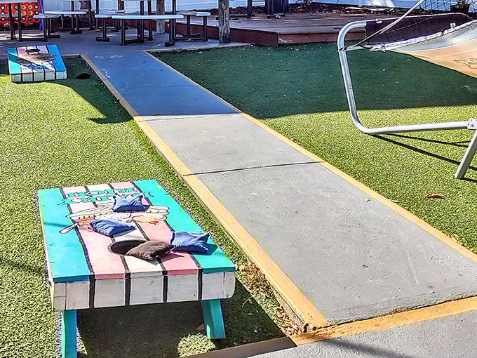 Kid paradise found &ndash; colorful benches and artificial turf create a playful space for the younger soft serve enthusiasts.